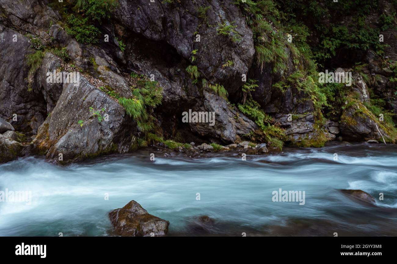 Beautiful river with fresh blue deep water and long rock. rural place ...