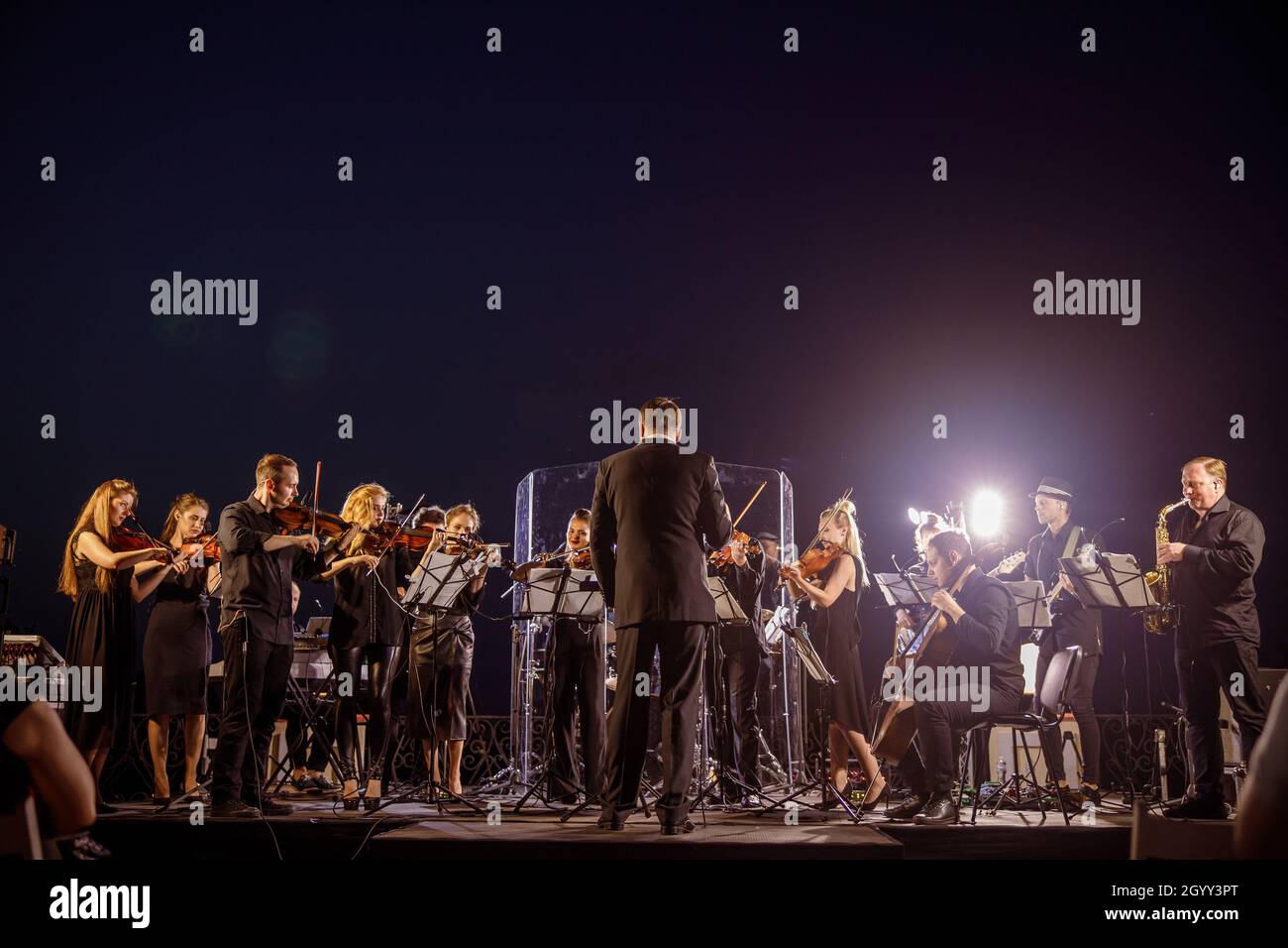 Orchestra performing outdoors hi-res stock photography and images - Alamy