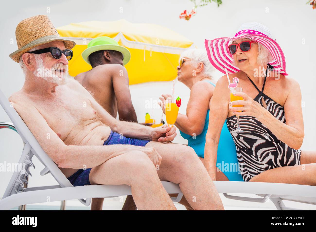 Happy Seniors Having Party In The Swimming Pool Elderly Friends At A