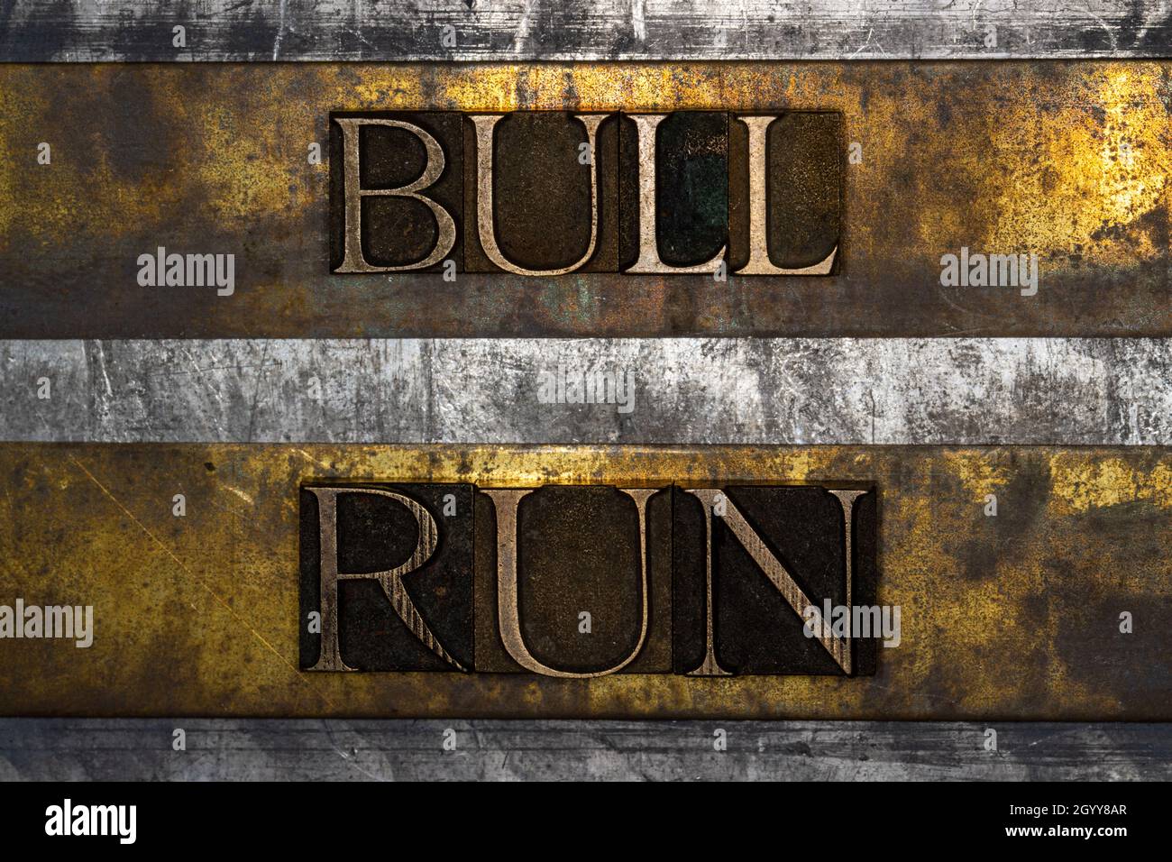 Bull Run text on textured grunge copper and vintage gold background ...