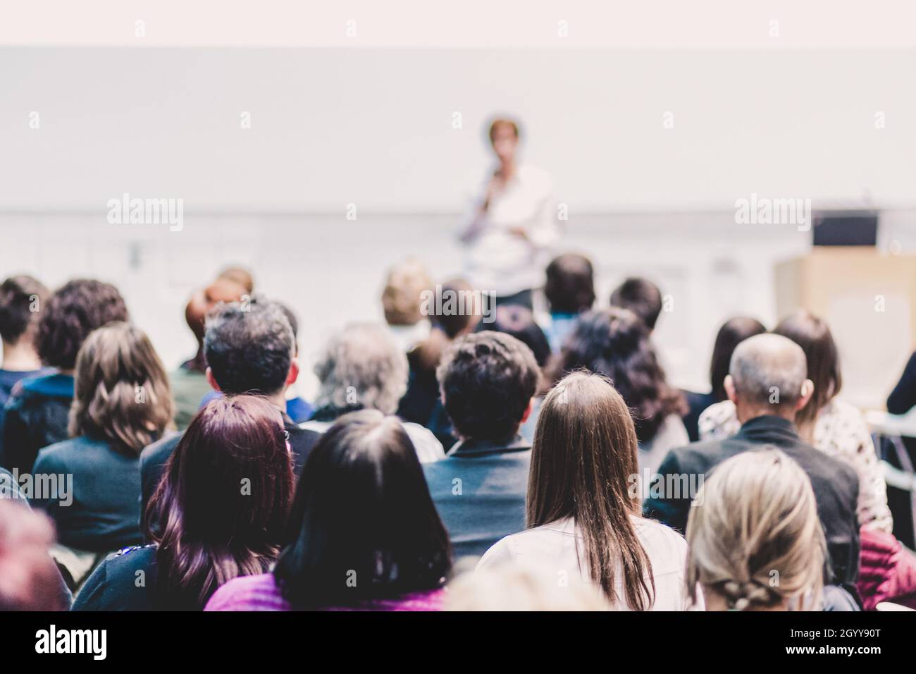 Woman giving presentation on business conference event Stock Photo - Alamy