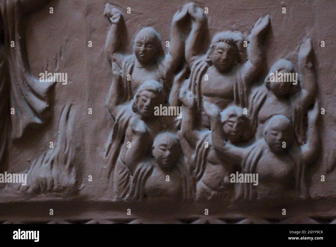 Indian saints praying to the Lord: These wall carvings depict saints praying to the deity .Their ...