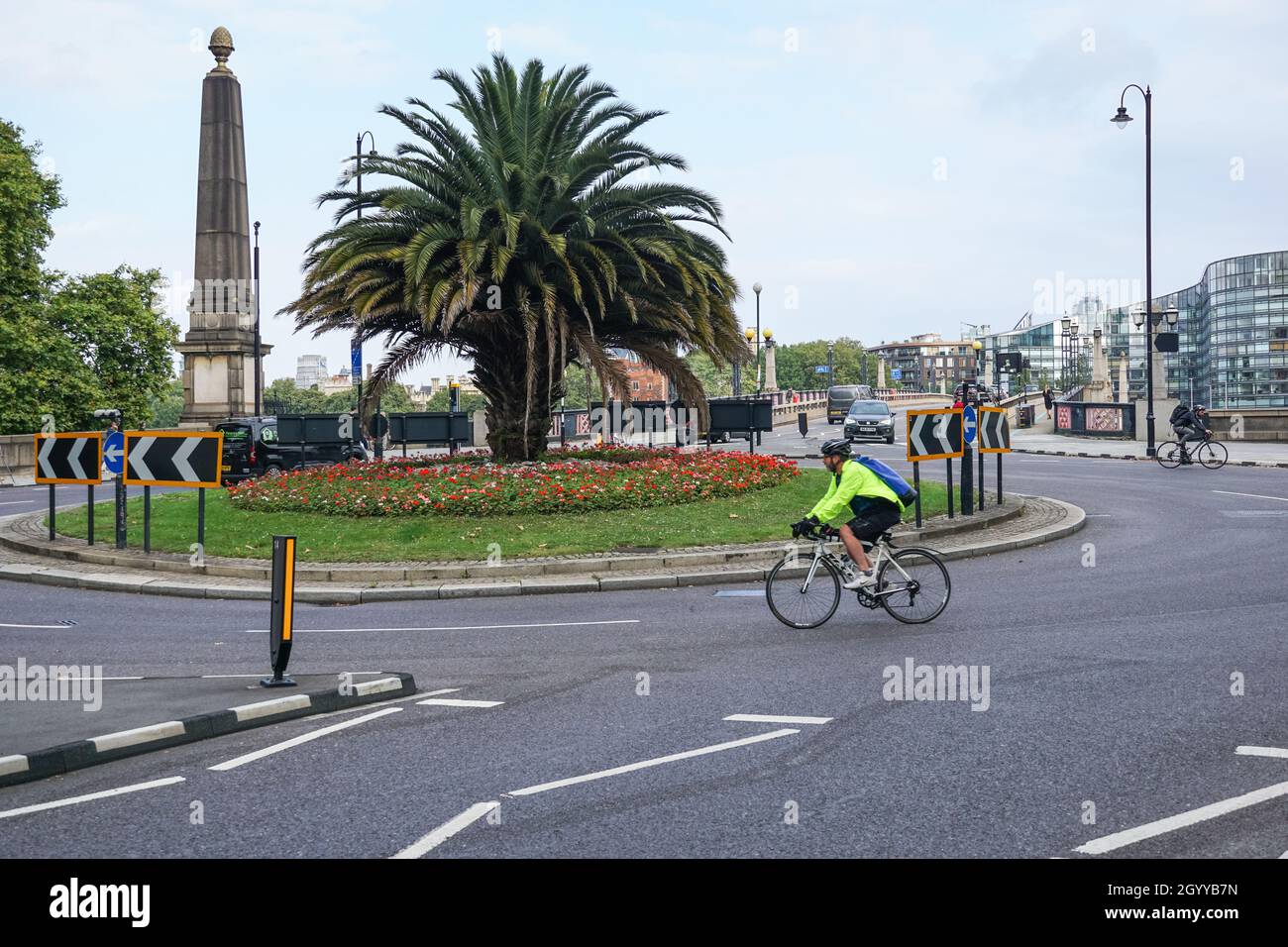Cyclist at Lambeth Bridge roundabout in Westminster, London England ...