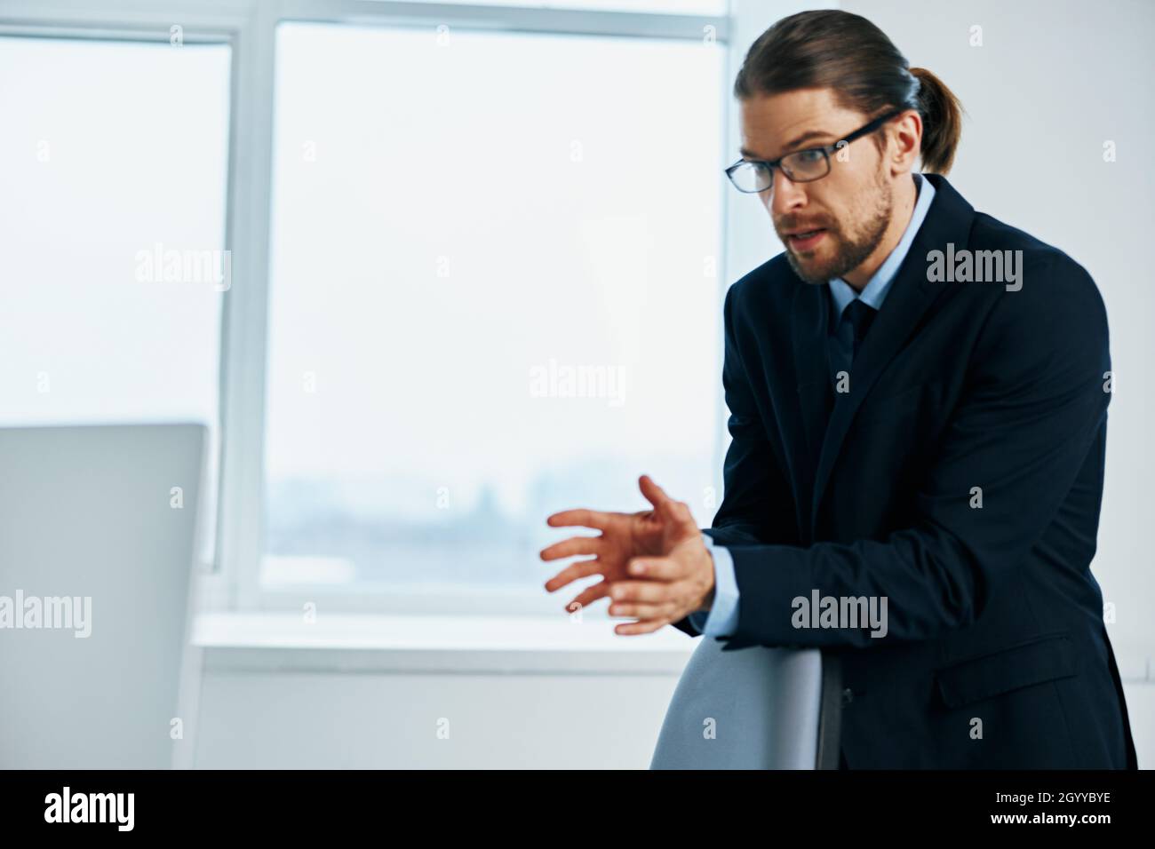office worker near the desktop work process Lifestyle Stock Photo - Alamy
