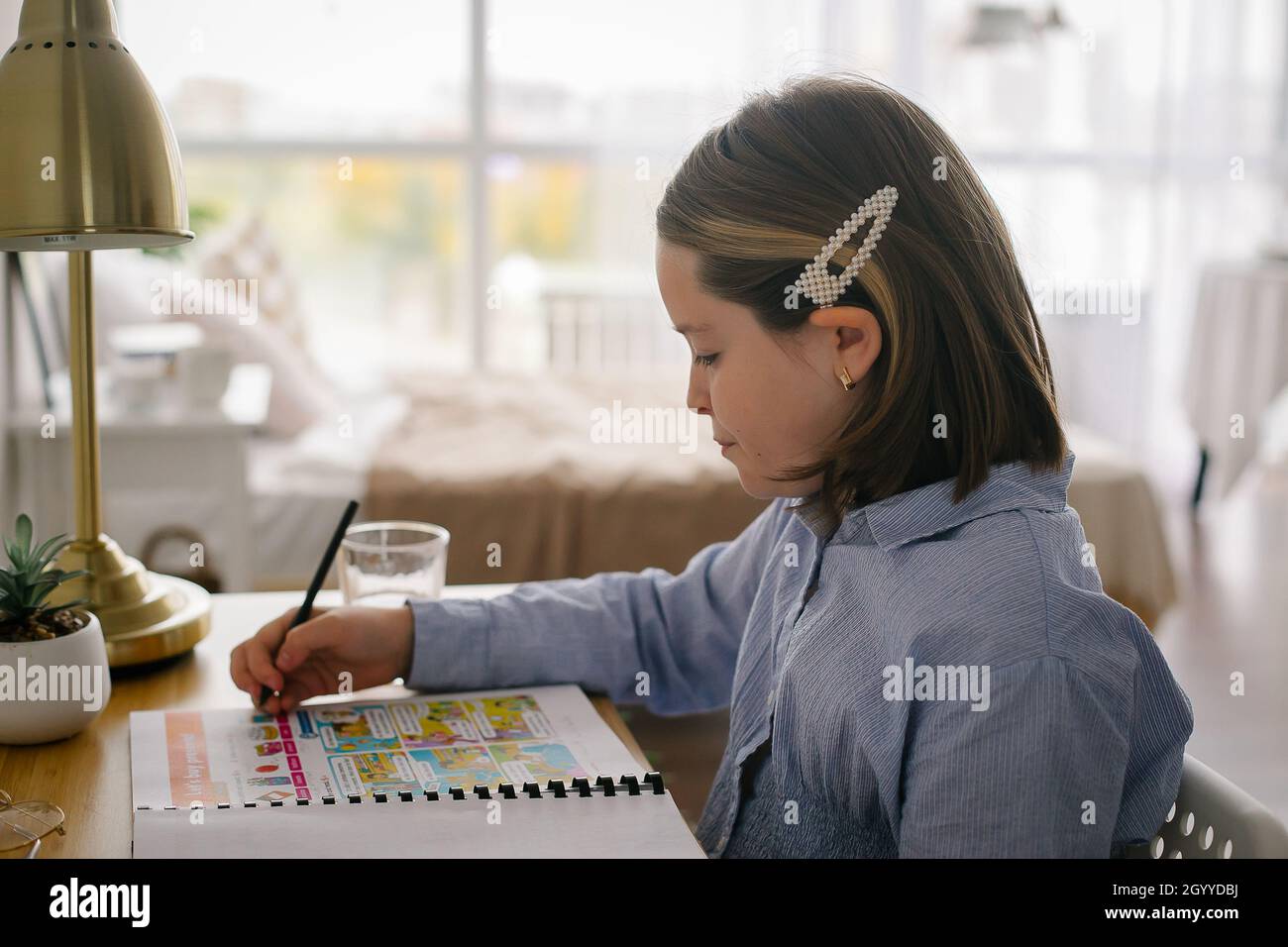 Young girl doing math hi-res stock photography and images - Alamy