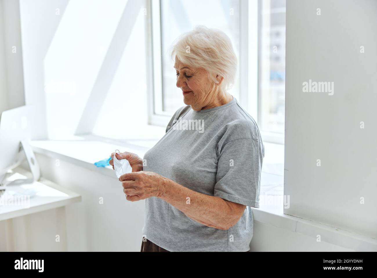 elderly woman medical mask virus protection Stock Photo - Alamy