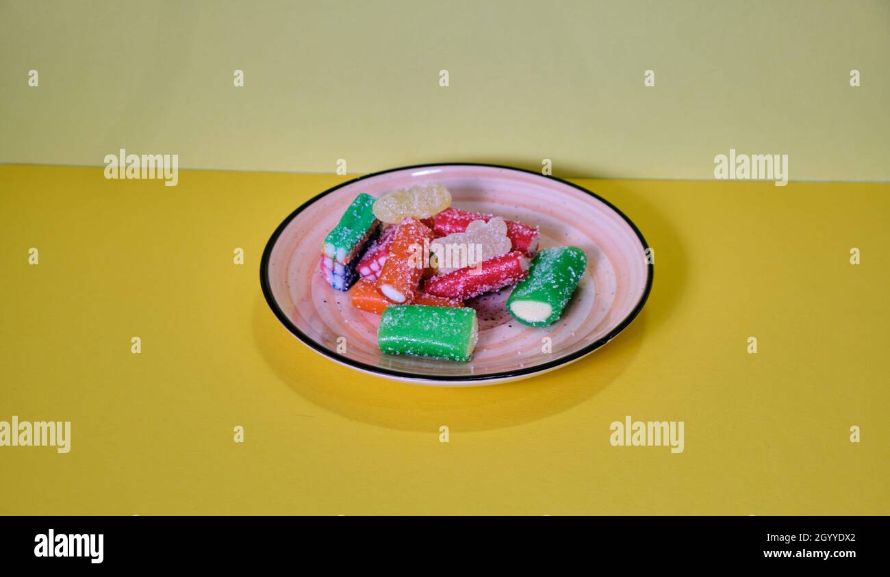 Food plate with various kinds of sweets. Shot made in studio with fash ...