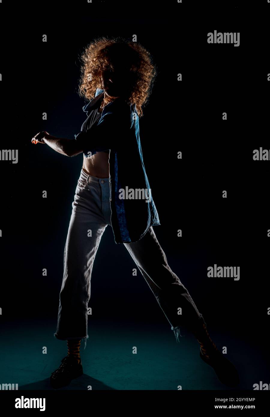 Athletic dancer performing an element of dance gymnastics Stock Photo ...