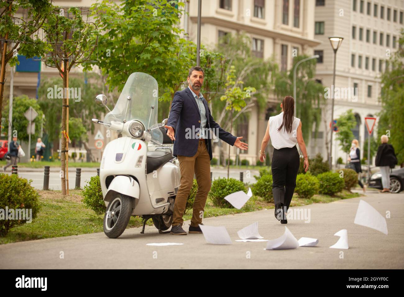 Female assistetn is quitting the job ans walking away from the ...