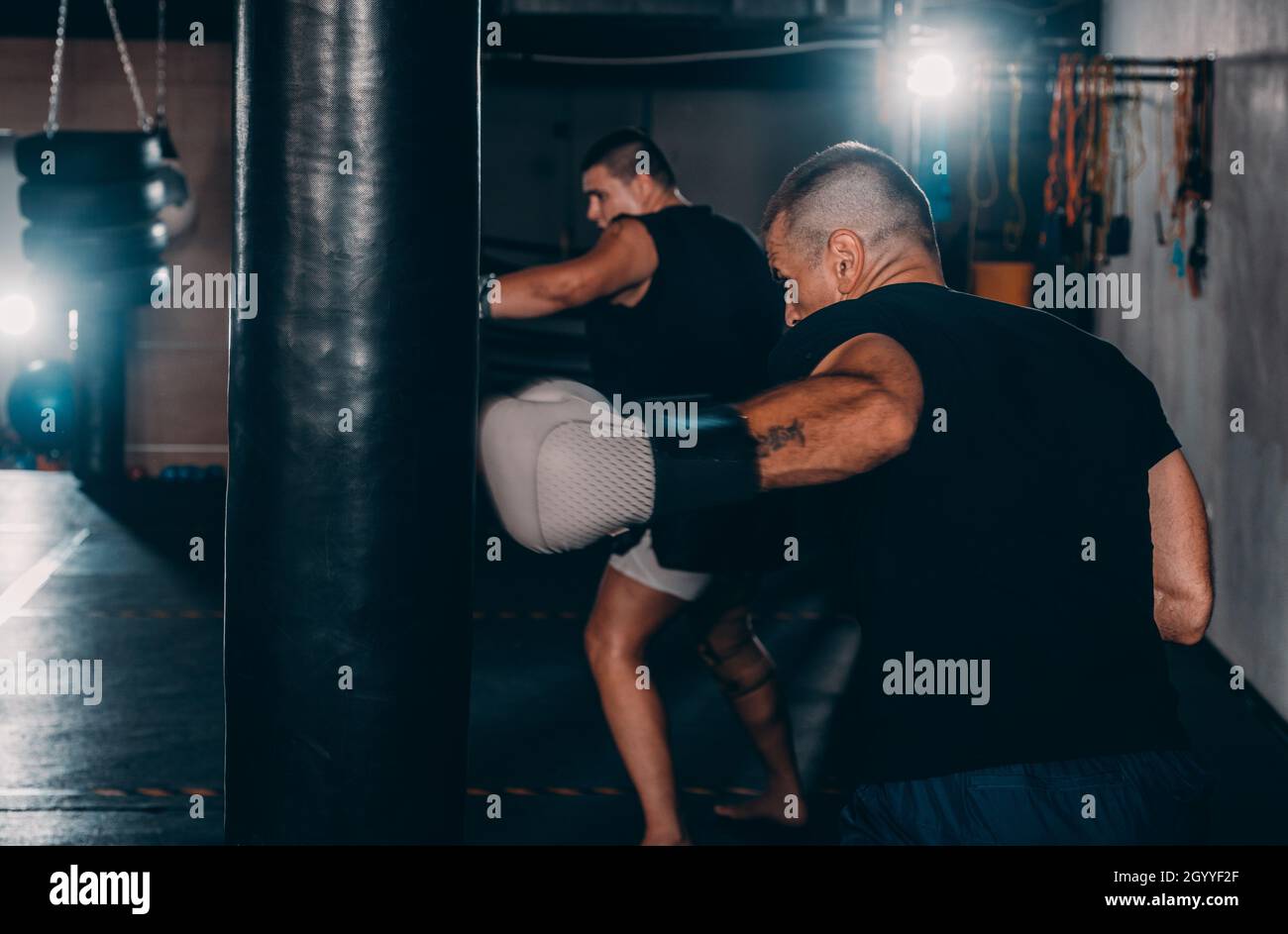 Boxer punching sand bag hi-res stock photography and images - Alamy