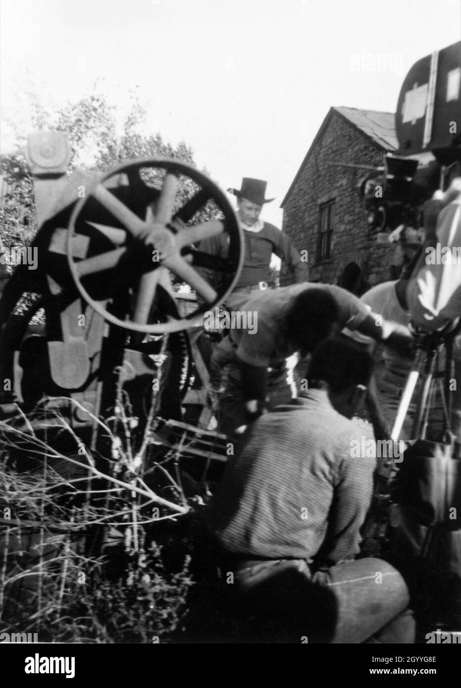 Snapshot of JOEL McCREA on set location candid with Camera Crew in Fall / Autumn 1948 during ...