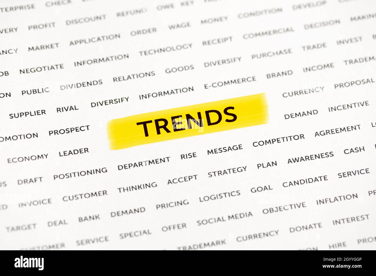 The word "Trends" is highlighted with a marker on paper Stock Photo - Alamy