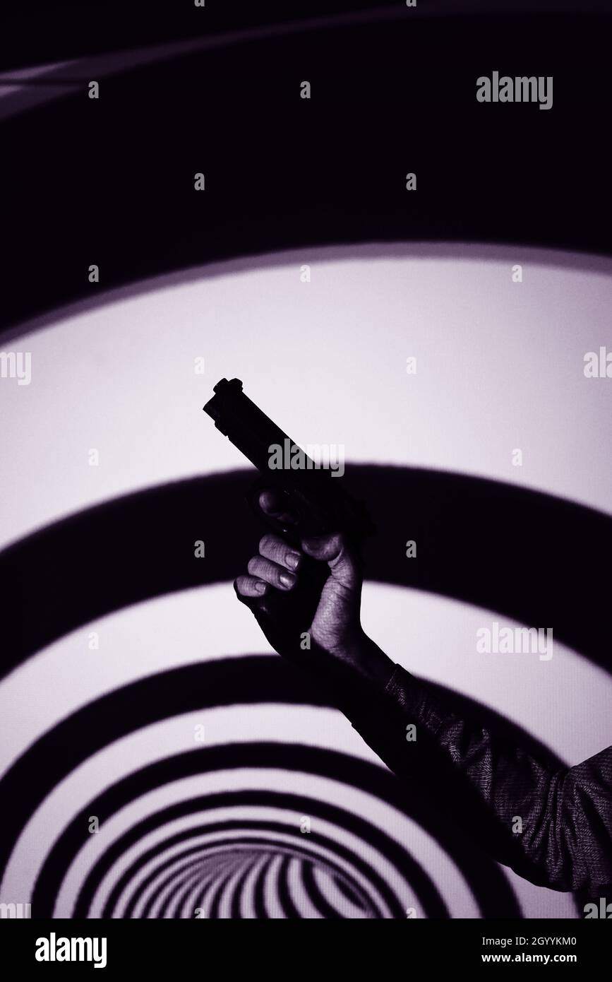 Spy thriller book cover design with man holding pistol gun Stock Photo ...