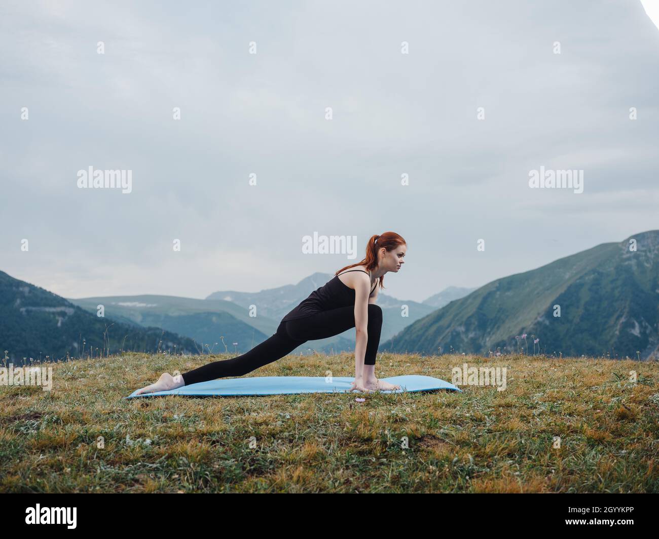 sportive woman outdoors yoga fresh air Stock Photo - Alamy