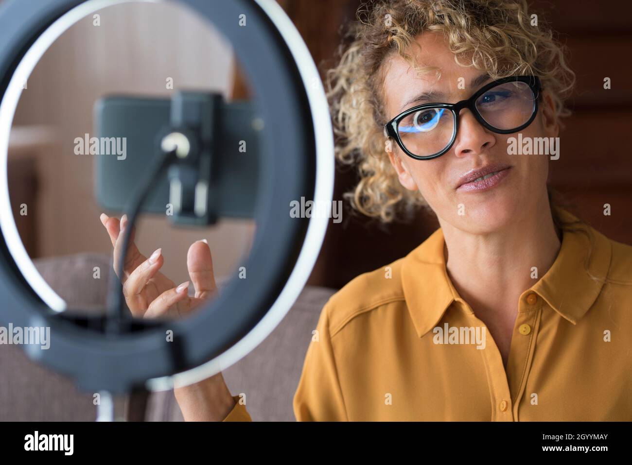 Young content creator recording videos hi-res stock photography and ...