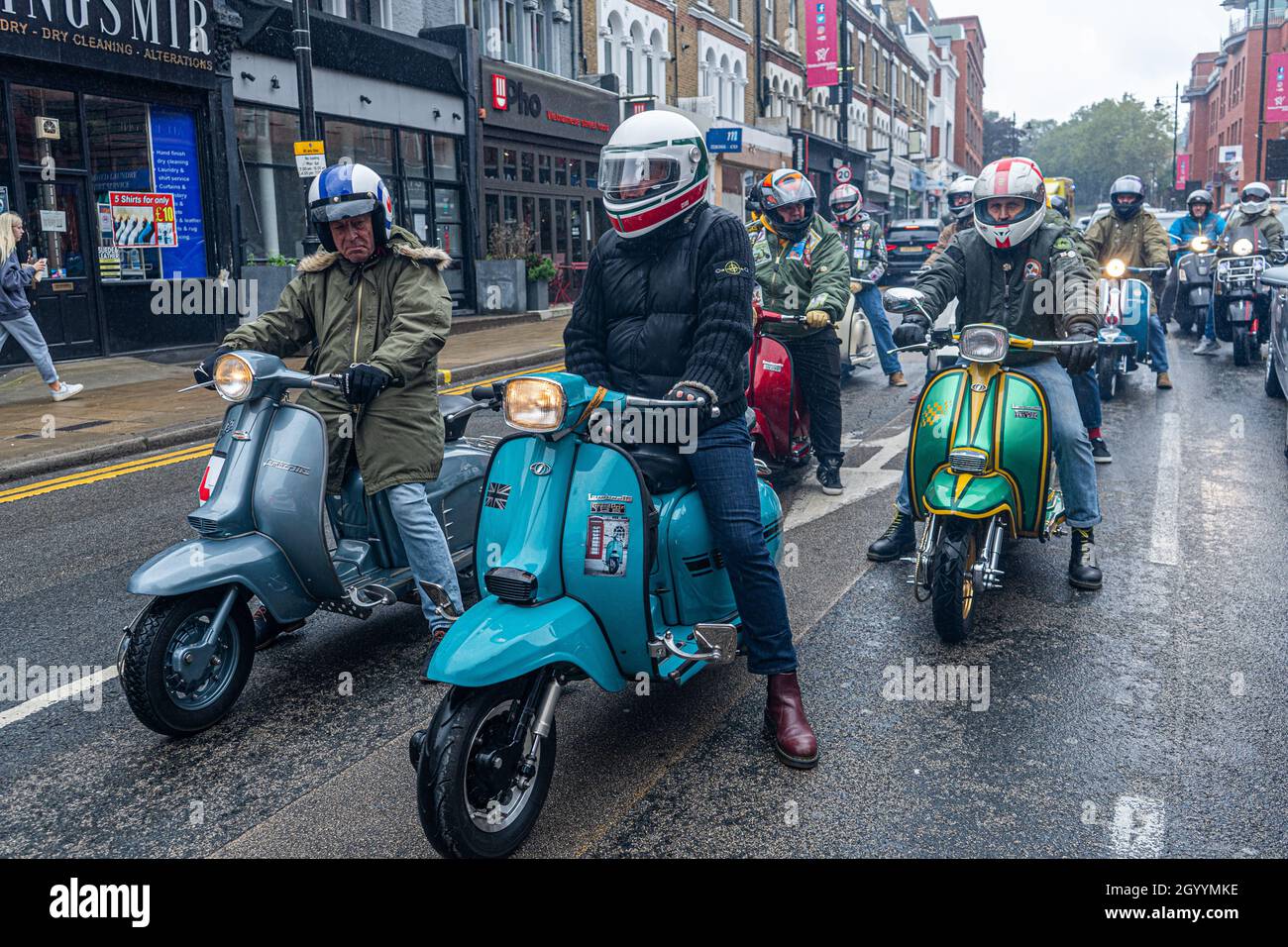 WIMBLEDON LONDON, UK. 10 Oct, 2021. A group of Mods scooter riders on ...