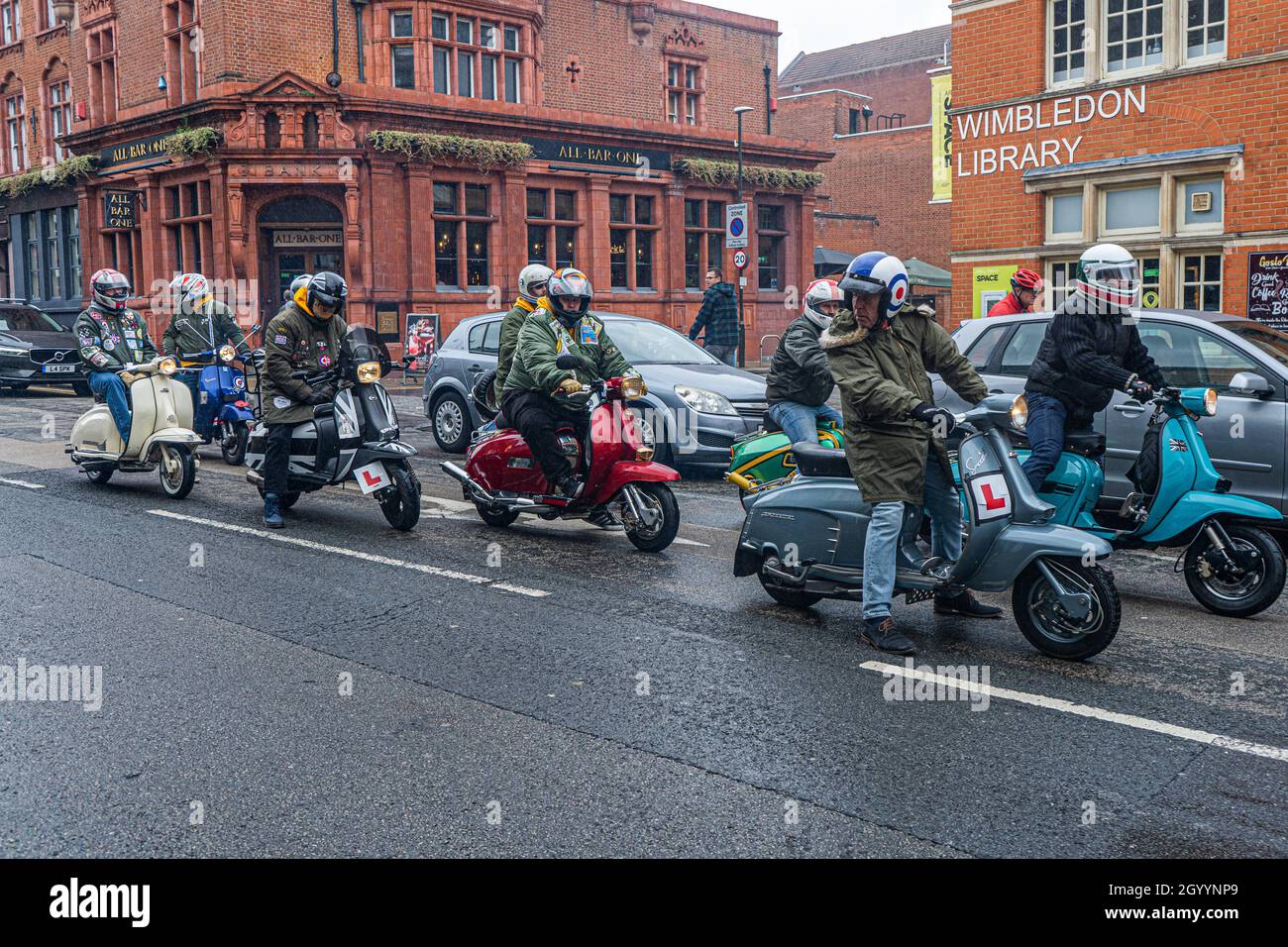 WIMBLEDON LONDON, UK. 10 Oct, 2021. A group of Mods scooter riders on ...