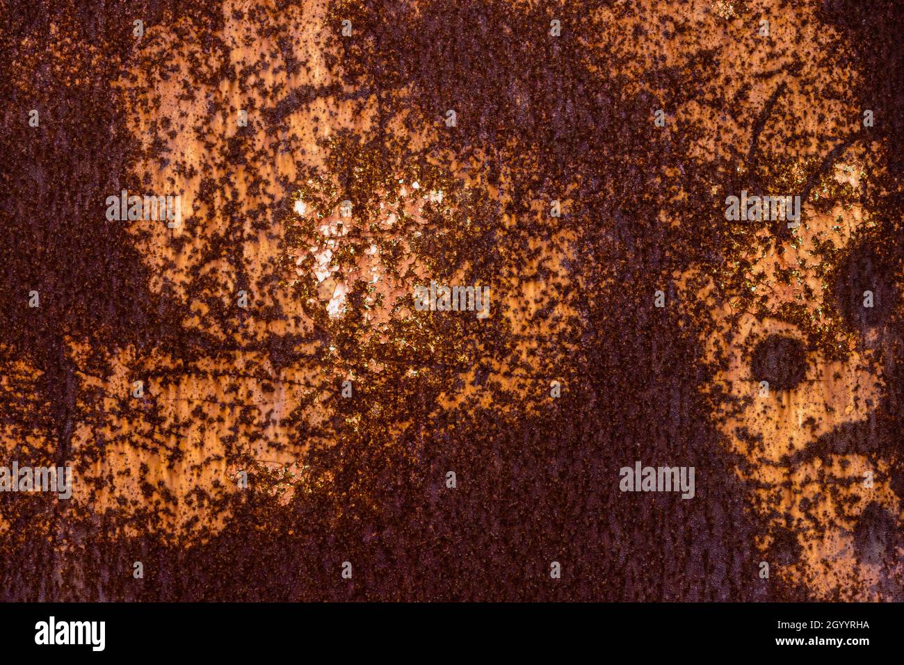 thick layer of brown rust of scratched steel sheet surface - full frame ...