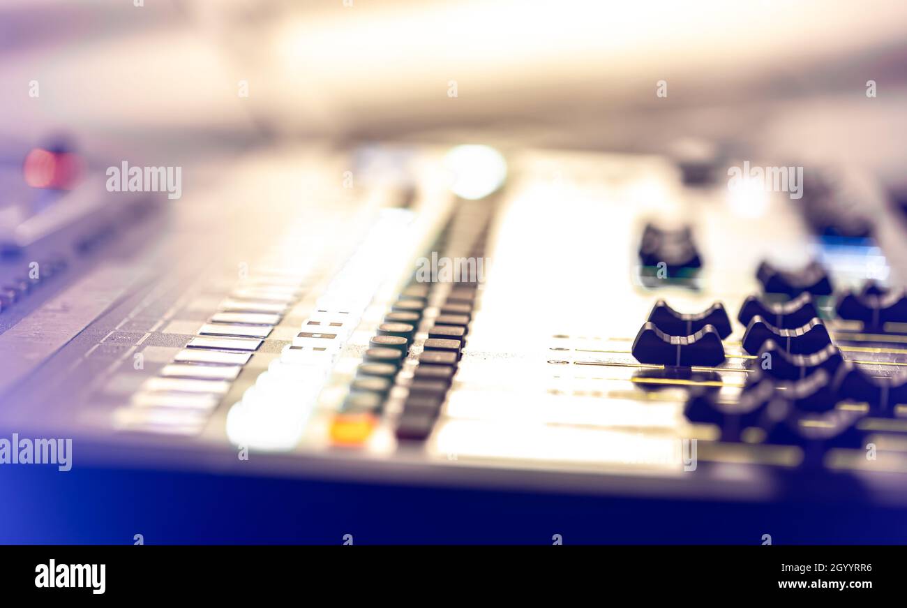 Sound mixer. Professional audio mixing console with lights, buttons ...