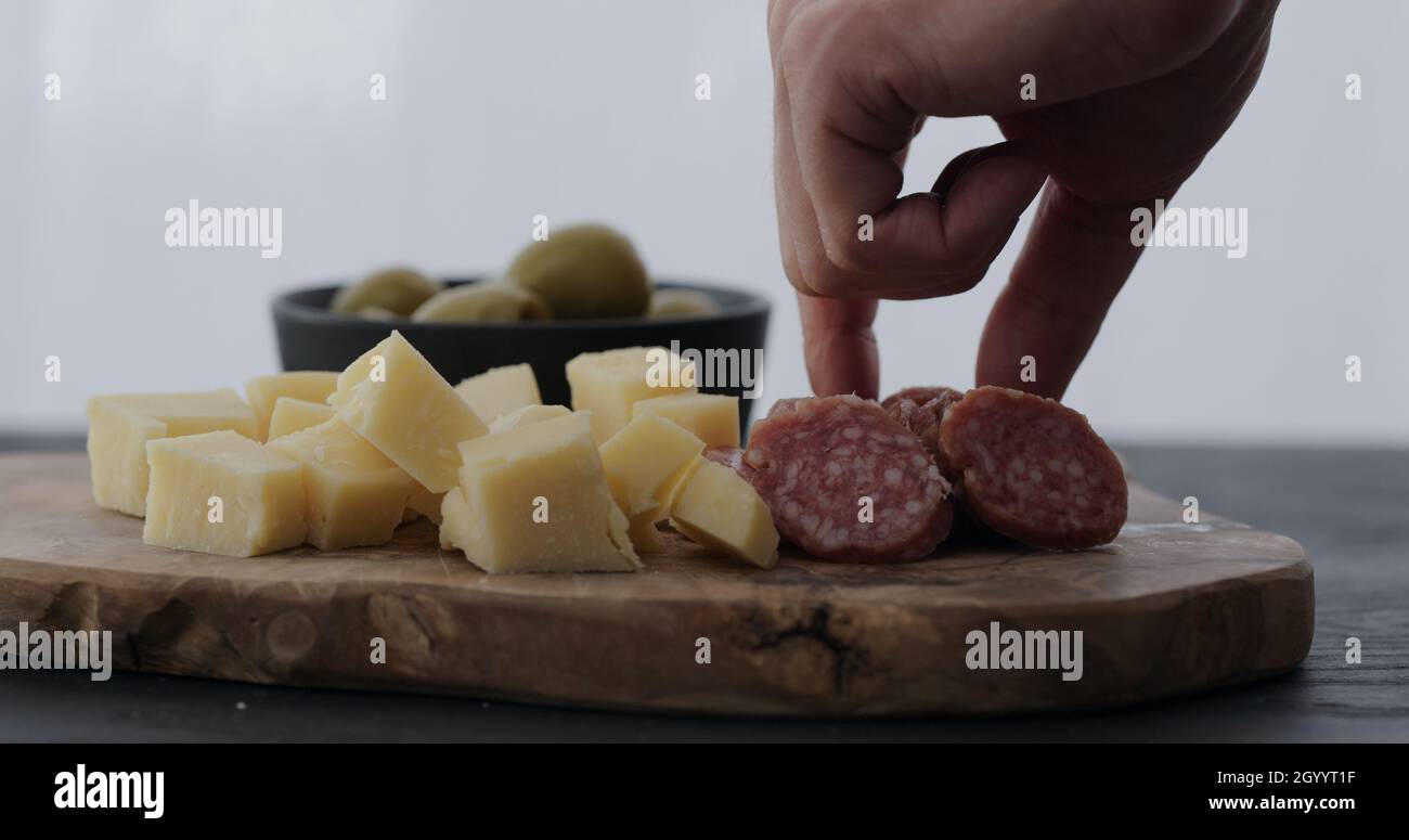 Man cutting vintage cheese on hi-res stock photography and images - Alamy