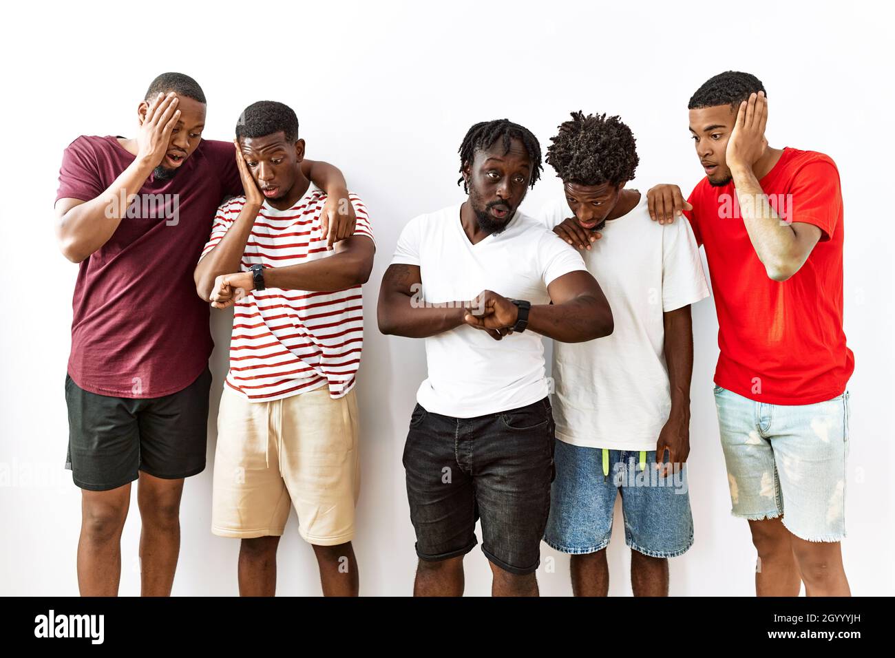 Young african group of friends standing together over isolated ...