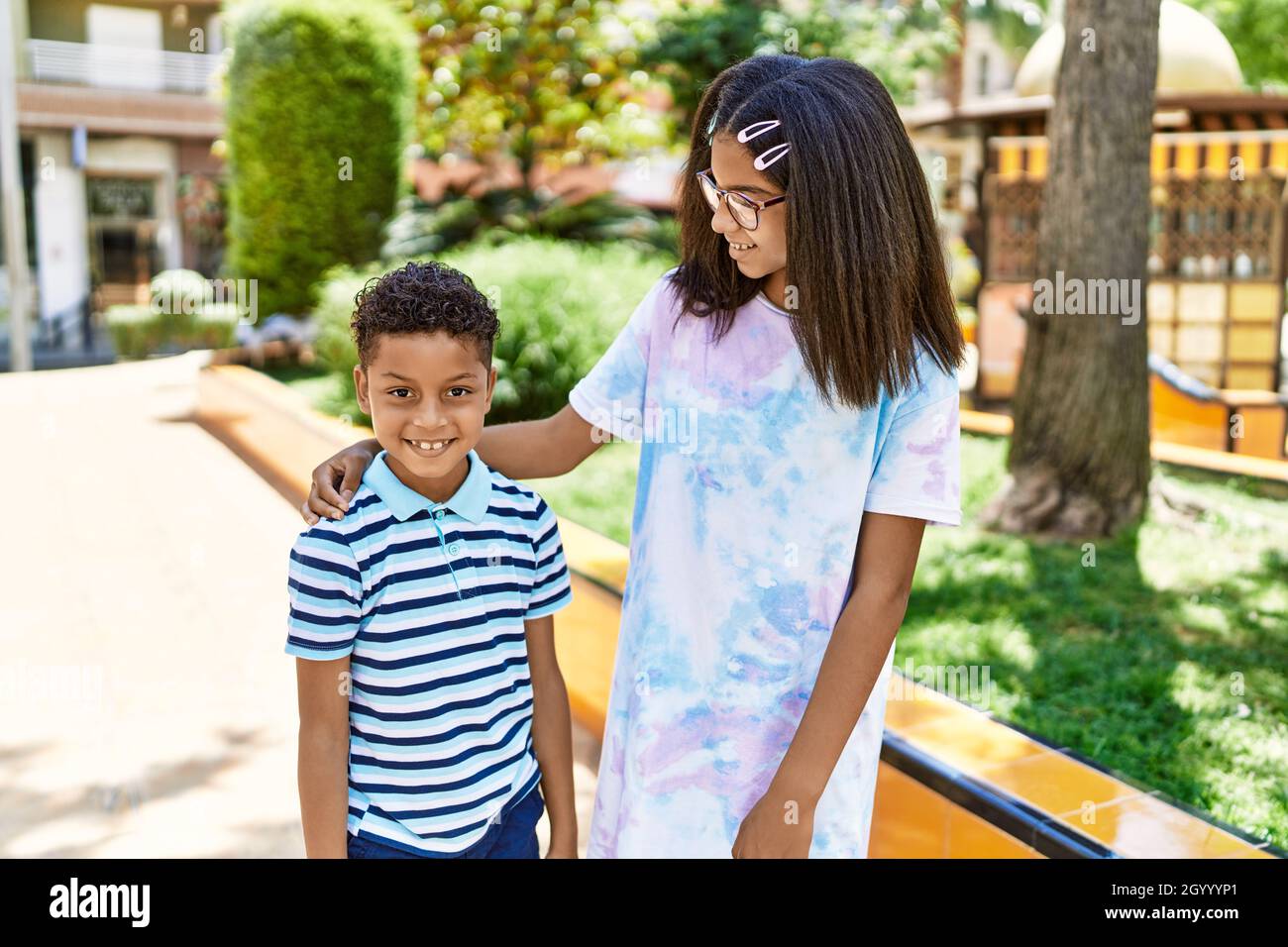 African american brother and sister smiling happy outdoors. Black ...