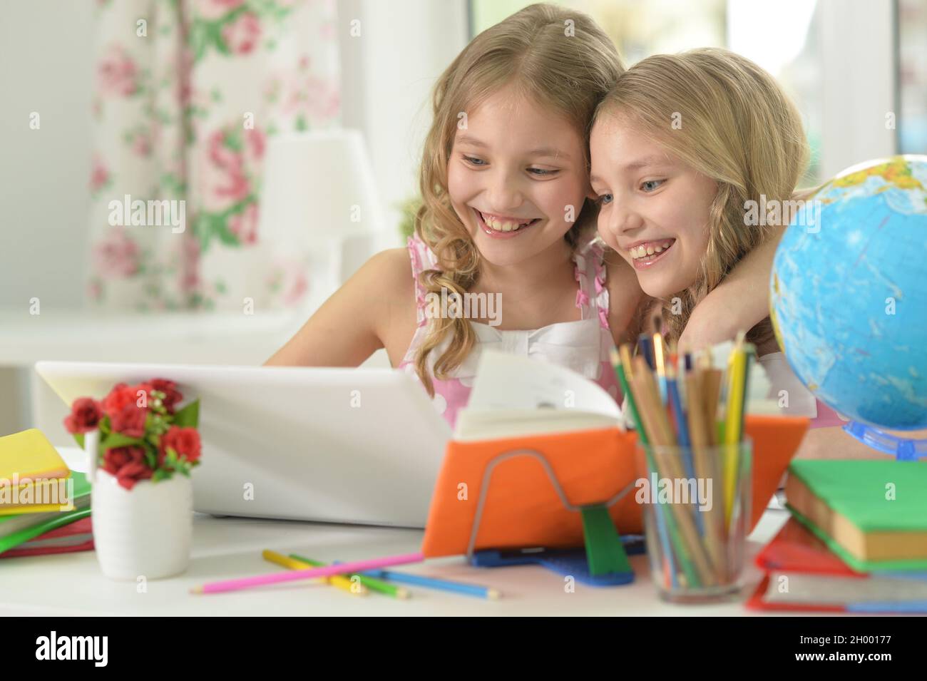 Portrait of cute girls on lesson Stock Photo - Alamy