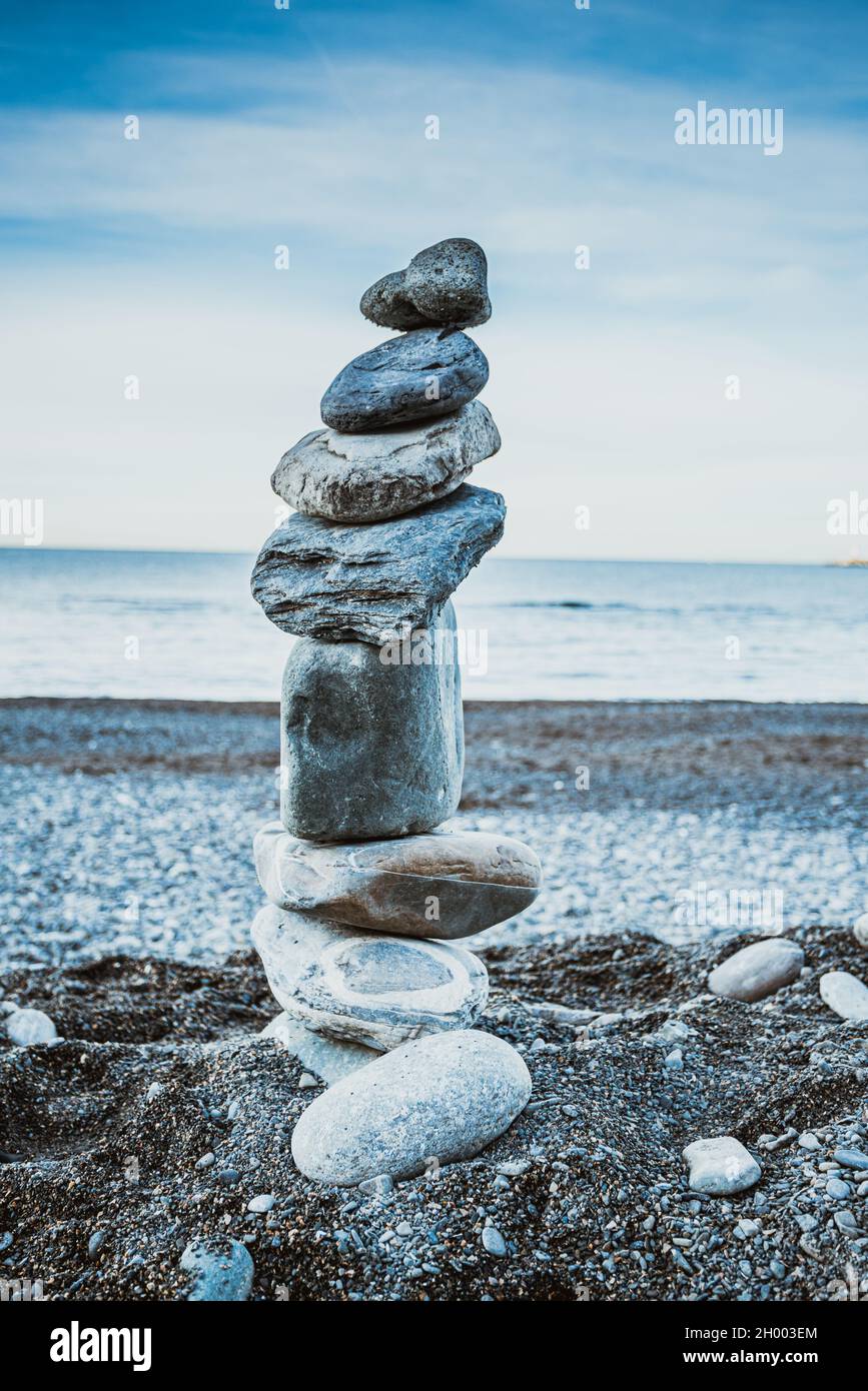 Stack of balanced stones on the beach Stock Photo - Alamy
