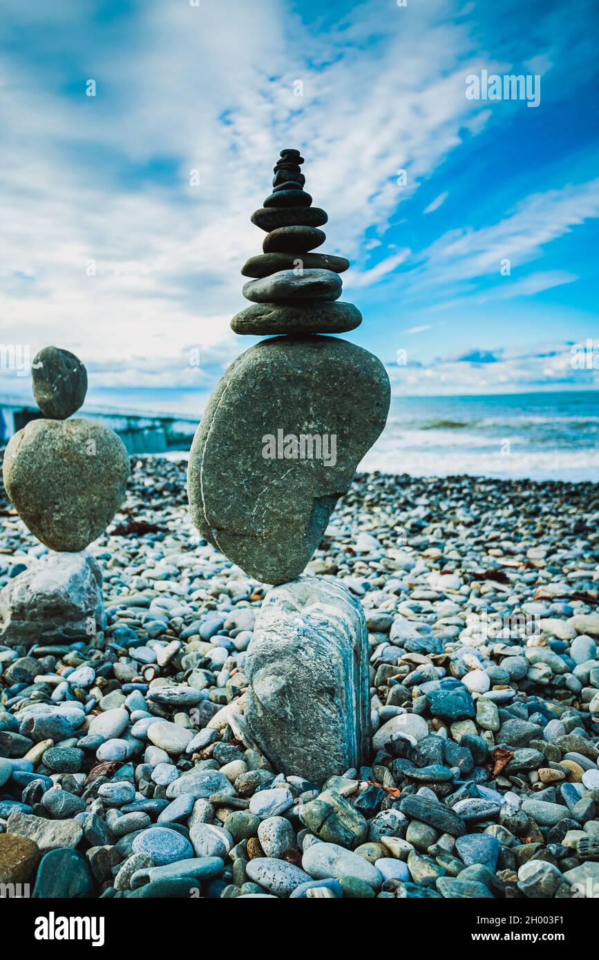 Stack of balanced stones on the beach Stock Photo - Alamy