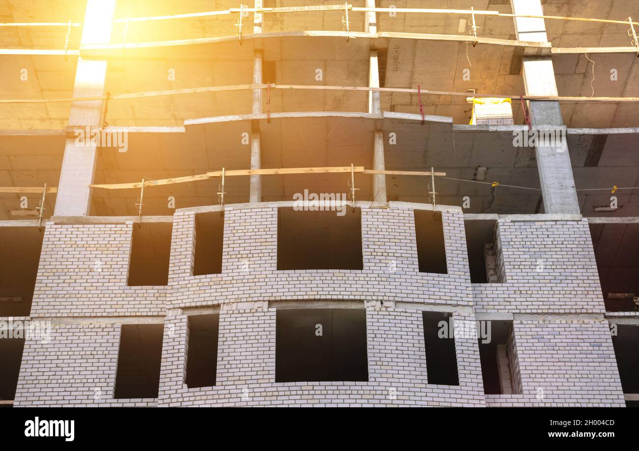 Brick walls on construction site of a new high rise residential ...