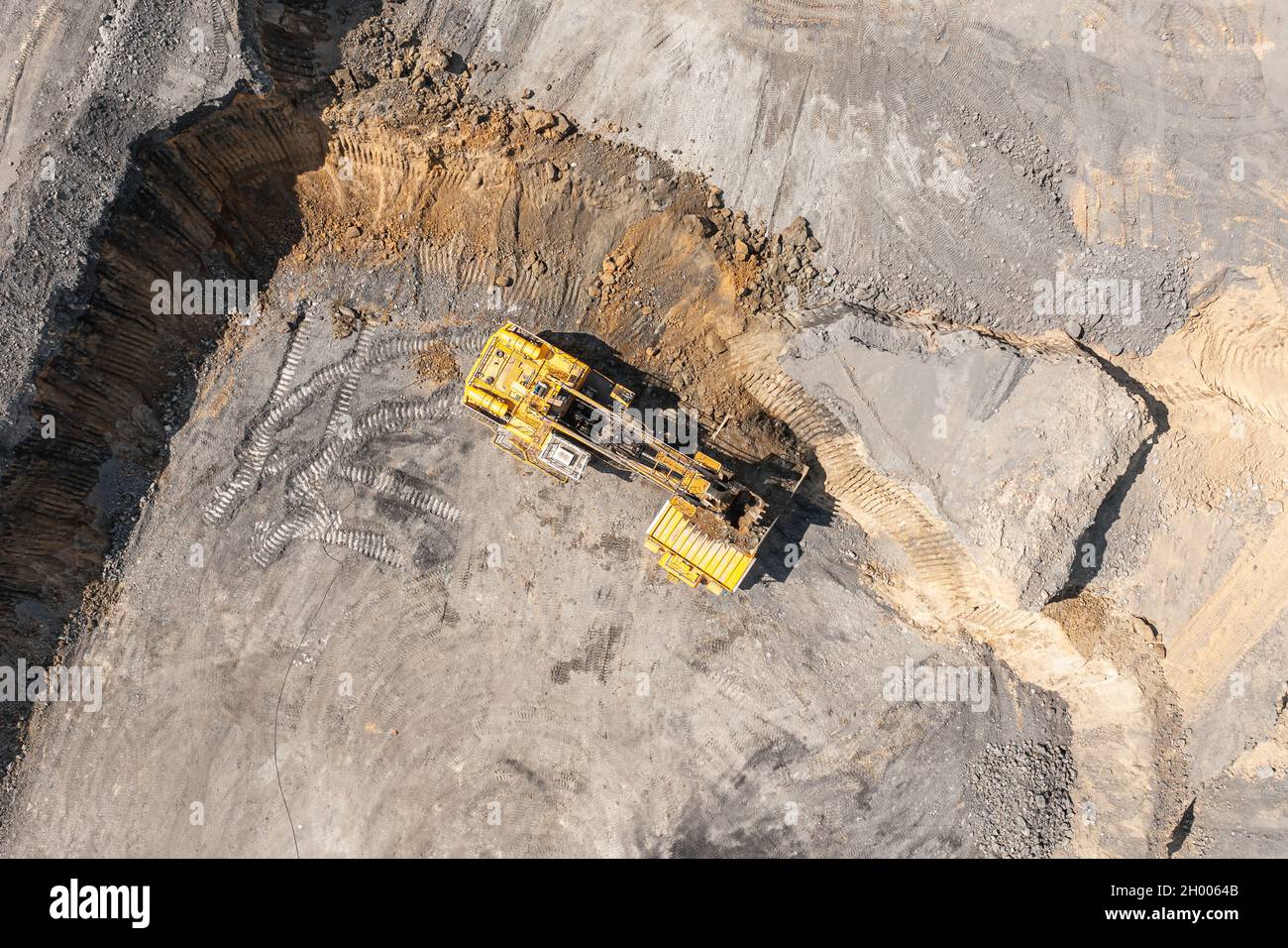 Panoramic aerial view of coal mine. Open pit mine industry, big yellow ...