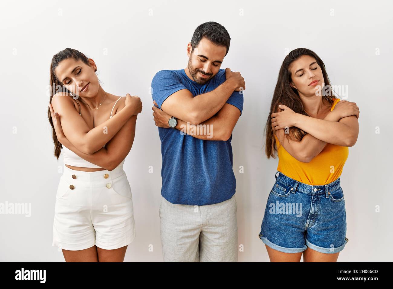 Group of young hispanic people standing over isolated background ...