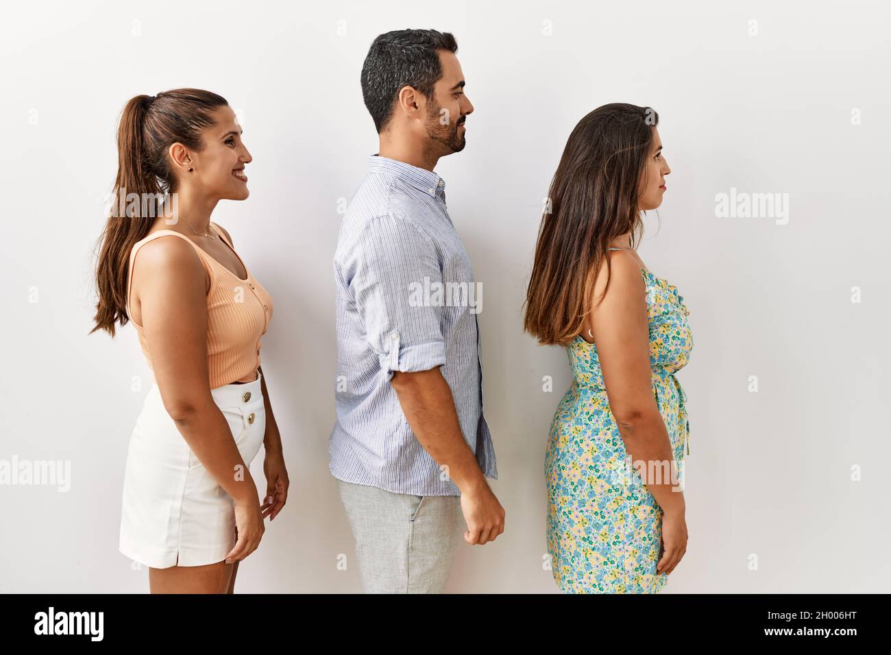 Group of young hispanic people standing over isolated background ...