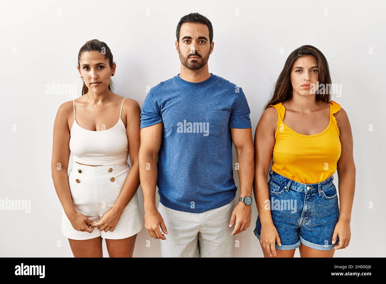 Group of young hispanic people standing over isolated background ...