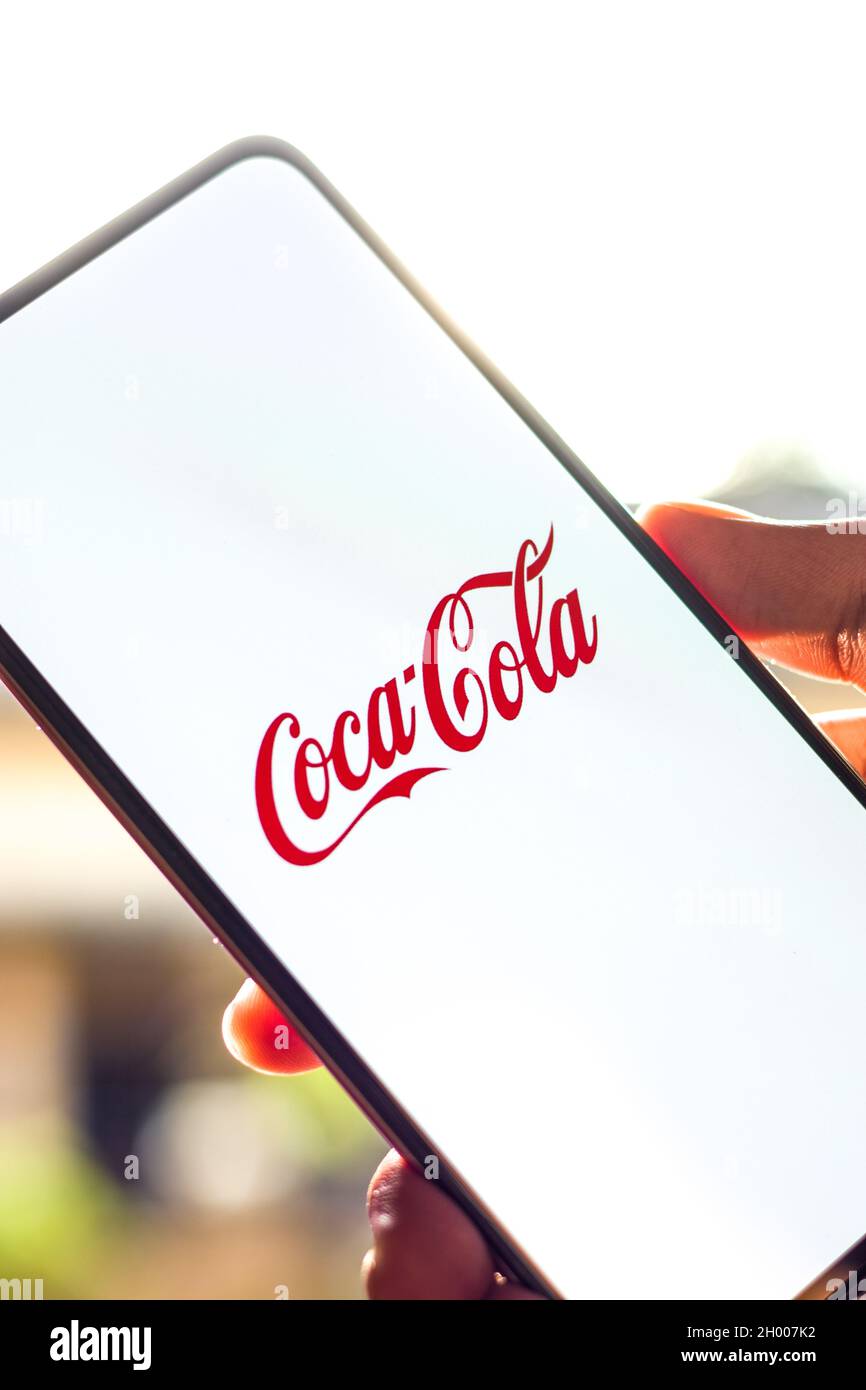 West Bangal, India - October 09, 2021 : Coca Cola logo on phone screen ...