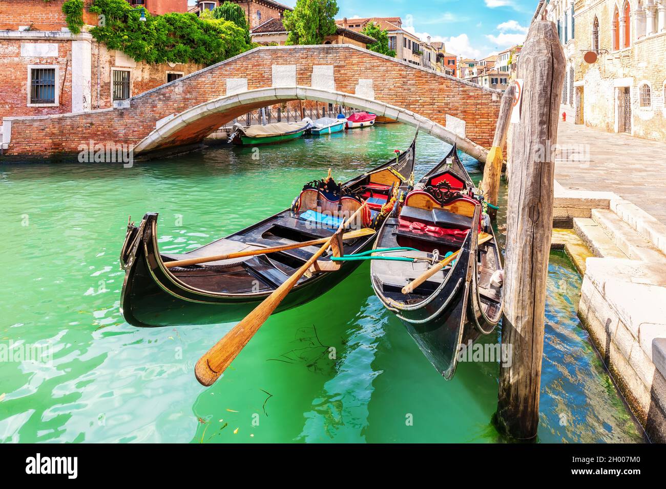 Gondolas moored in the Grand Canal of Venice, Italy Stock Photo - Alamy