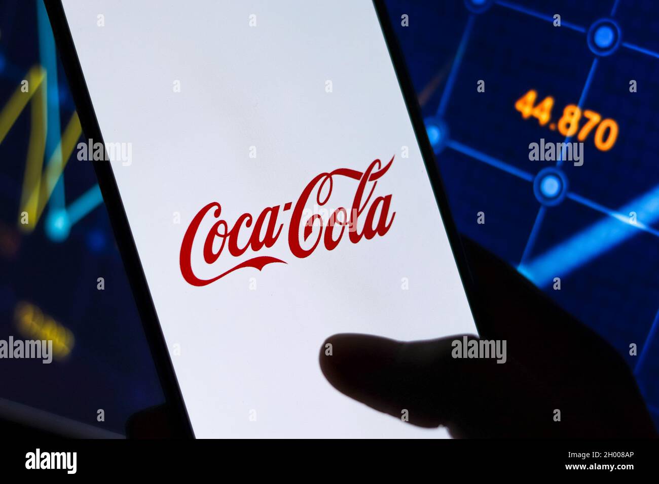 West Bangal, India - October 09, 2021 : Coca Cola logo on phone screen ...