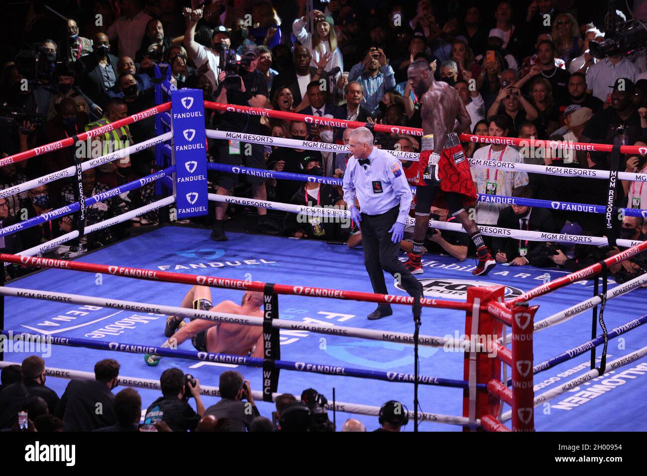 Las Vegas, United States. 10th Oct, 2021. Tyson Fury is knocked down a ...