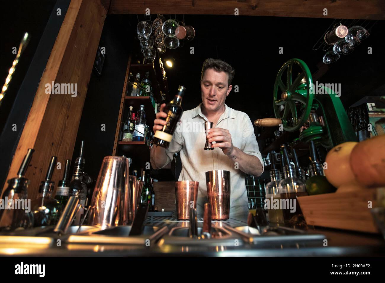 Liquor Bottles Behind Bar High Resolution Stock Photography and Images ...