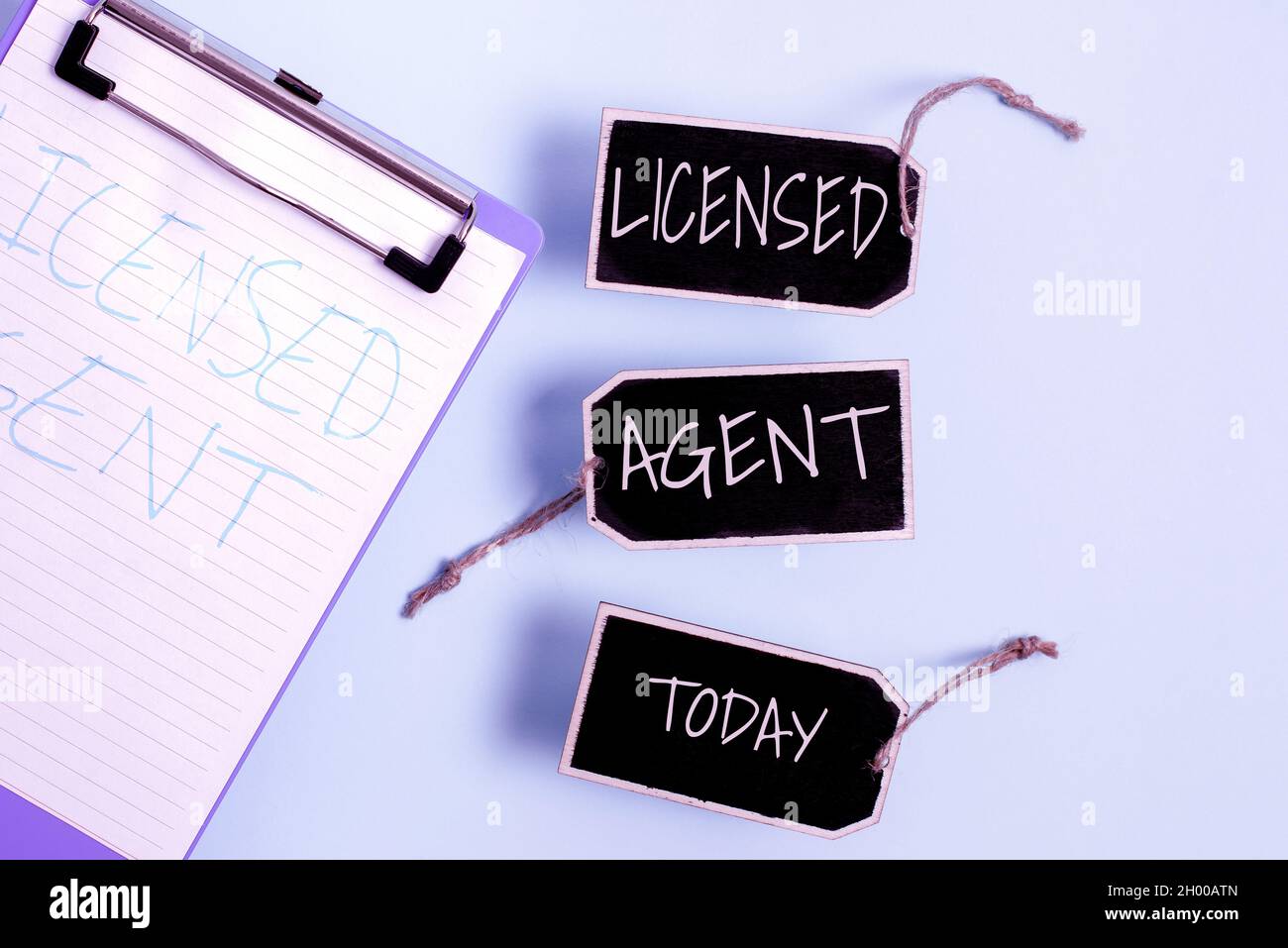 Text caption presenting Licensed Agent. Concept meaning Authorized and ...