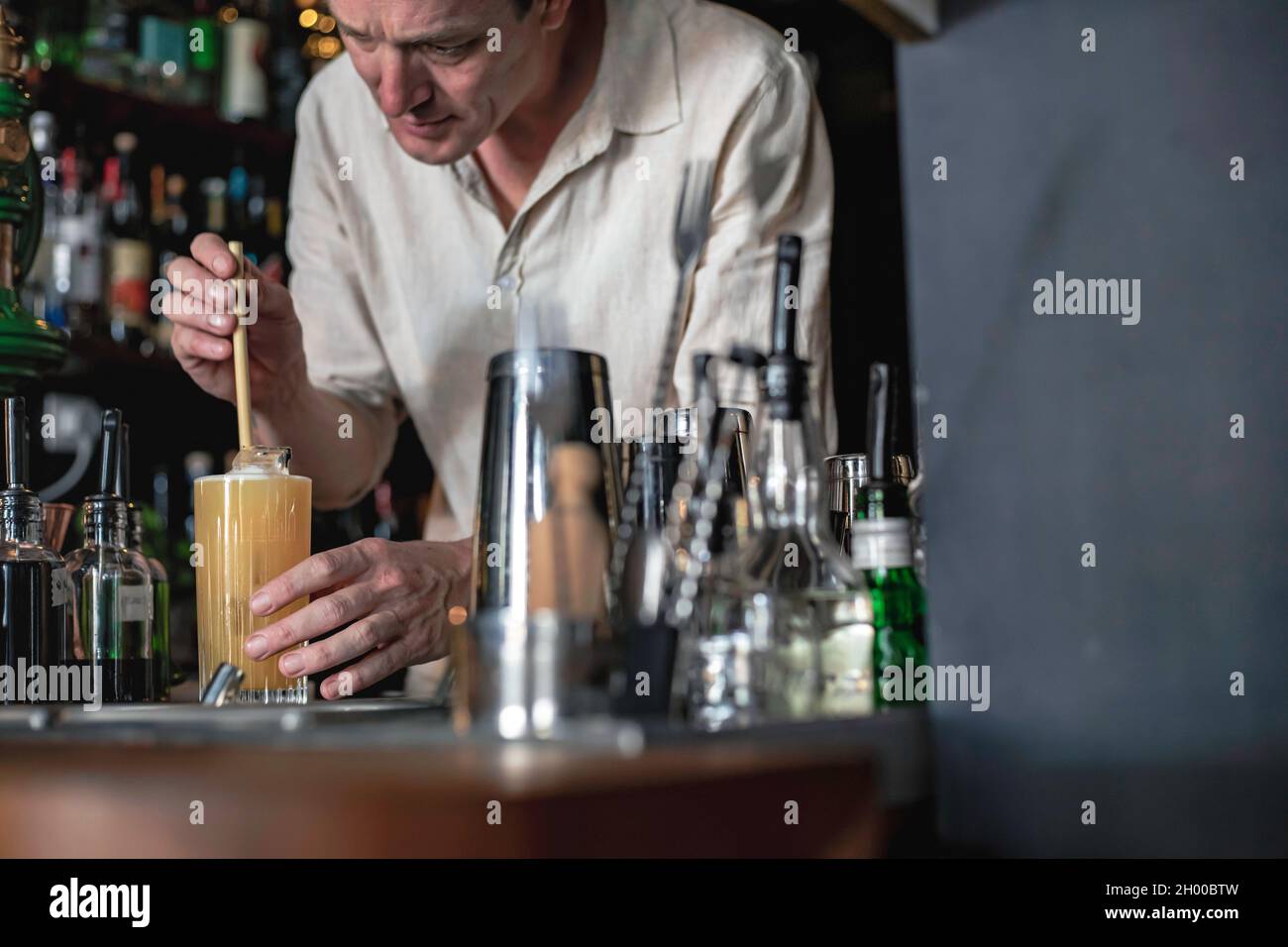 Man behind bar in house hi-res stock photography and images - Alamy