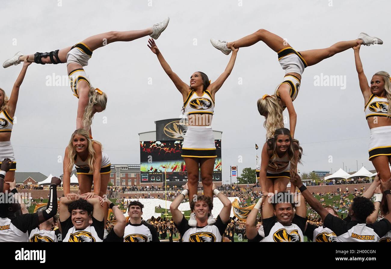 Mizzou cheerleaders perform a difficult stunt during the North Texas ...