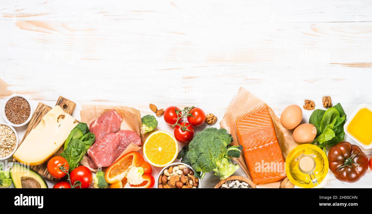 Healthy fats products at black background Stock Photo - Alamy