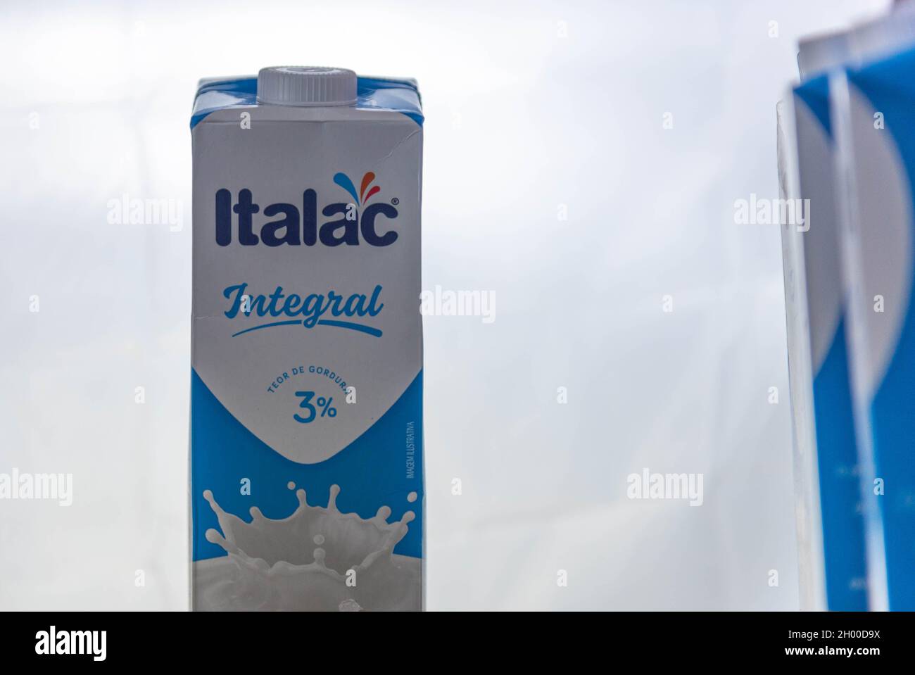 Box of whole milk on white background illuminated. Full cream milk ...