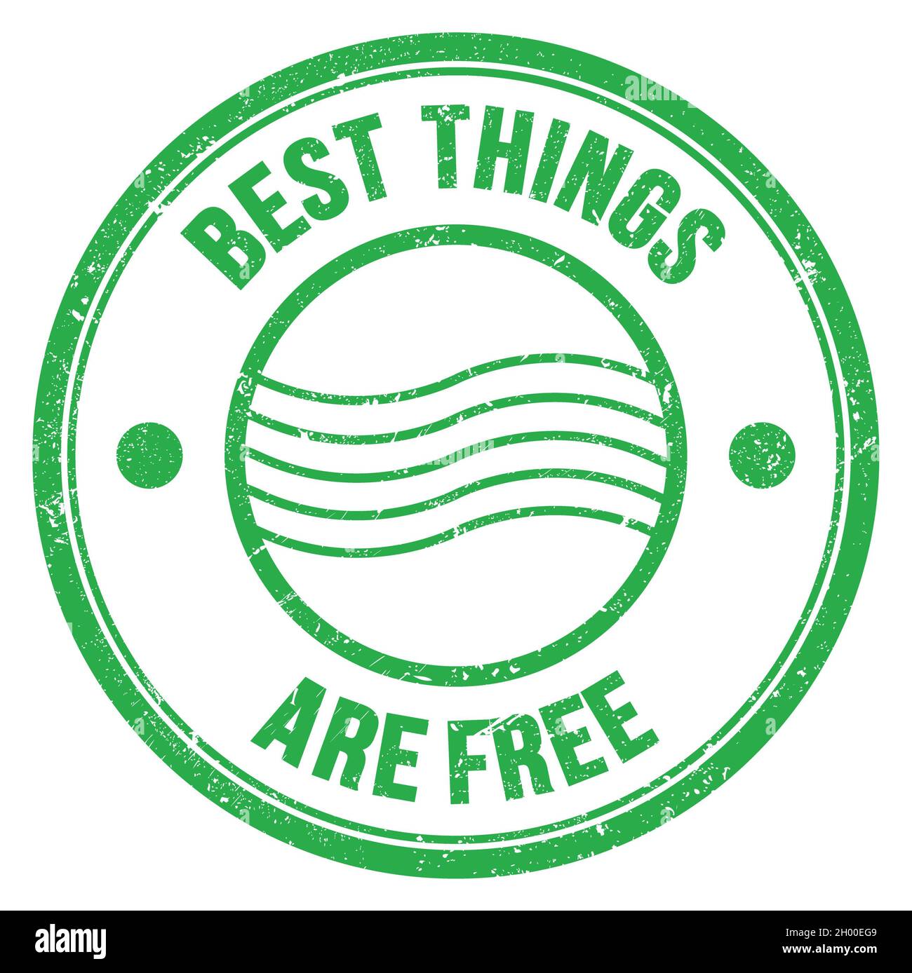BEST THINGS ARE FREE text written on green round postal stamp sign ...