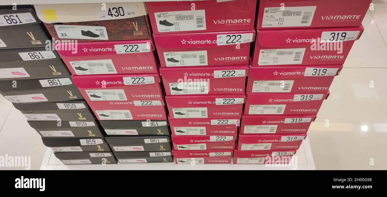 Shoe boxes. Women's shoes on sale. Department store. Female fashion and ...