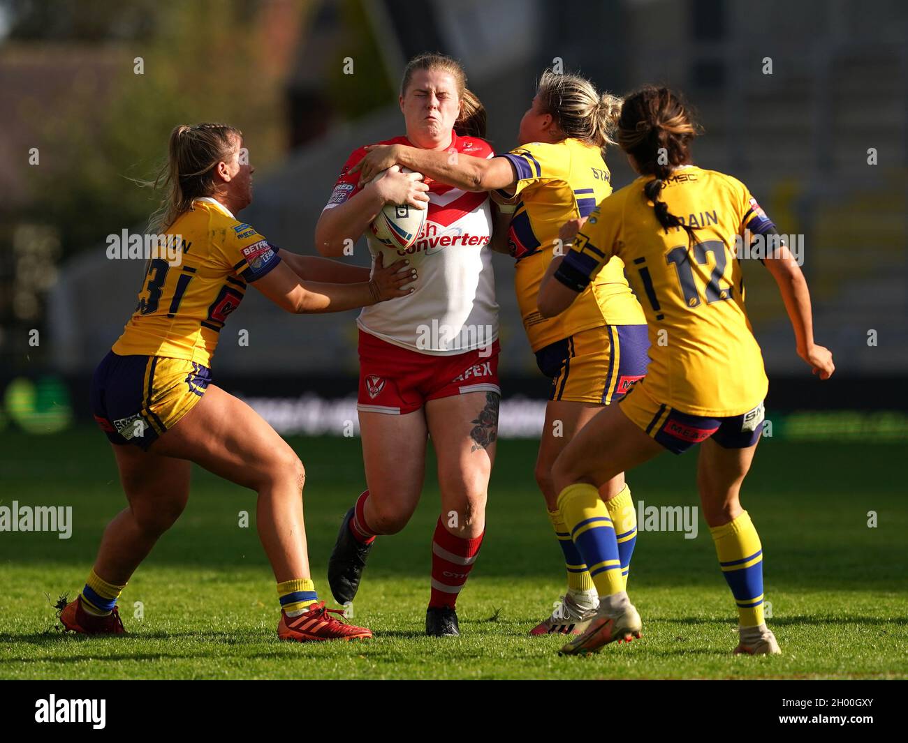 St Helens' Victoria Whitfield tackled by Leeds Rhinos' Orla McCallion ...