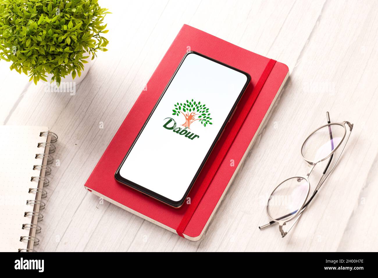 West Bangal, India - October 09, 2021 : Dabur logo on phone screen ...