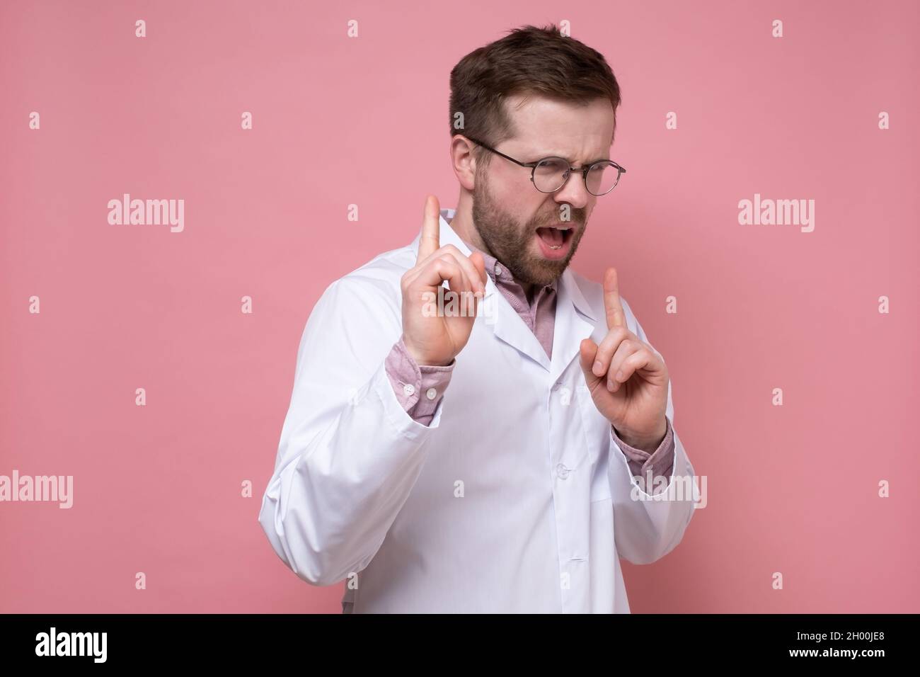 Angry pointing doctor hi-res stock photography and images - Alamy
