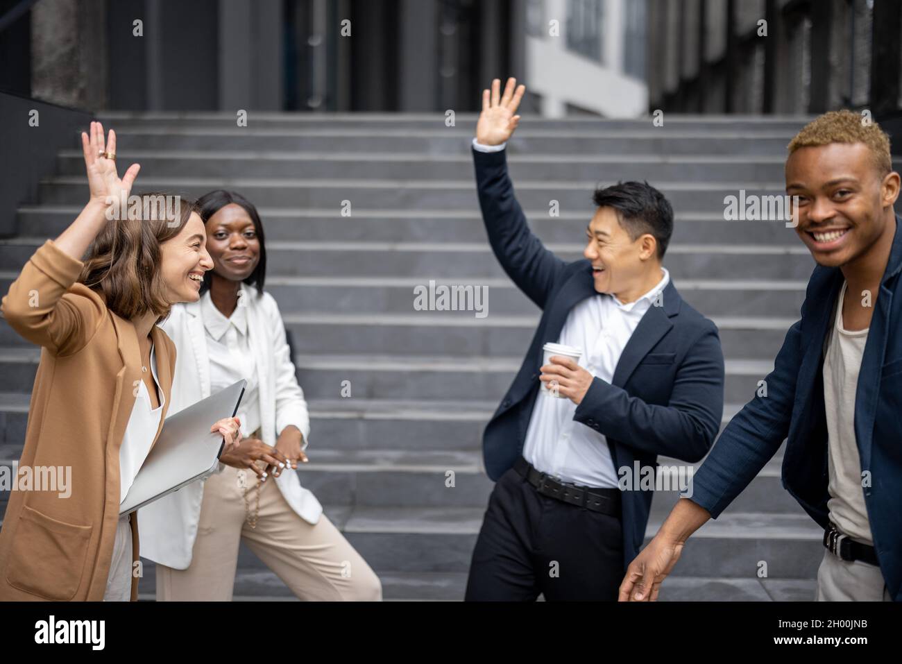 Girls giving high five hi-res stock photography and images - Alamy